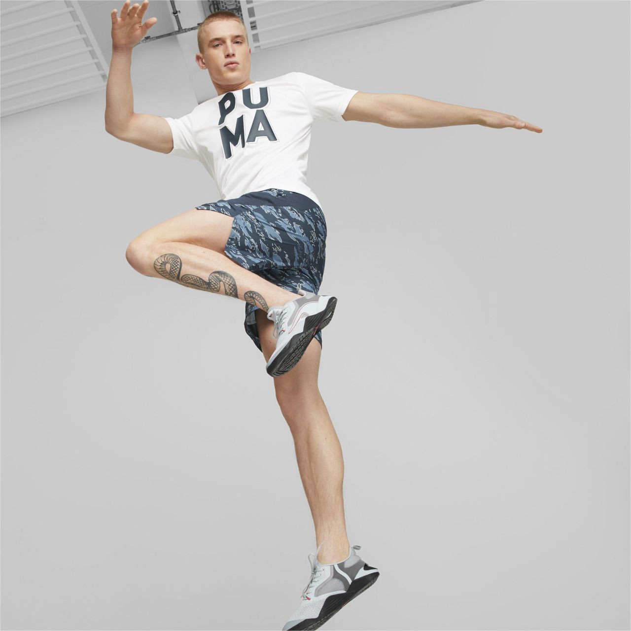 Puma Train Concept Graphic Tee | SportFits Shop