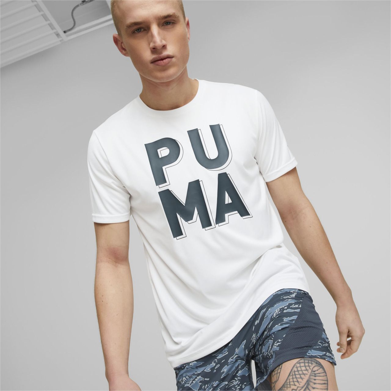 Puma Train Concept Graphic Tee | SportFits Shop